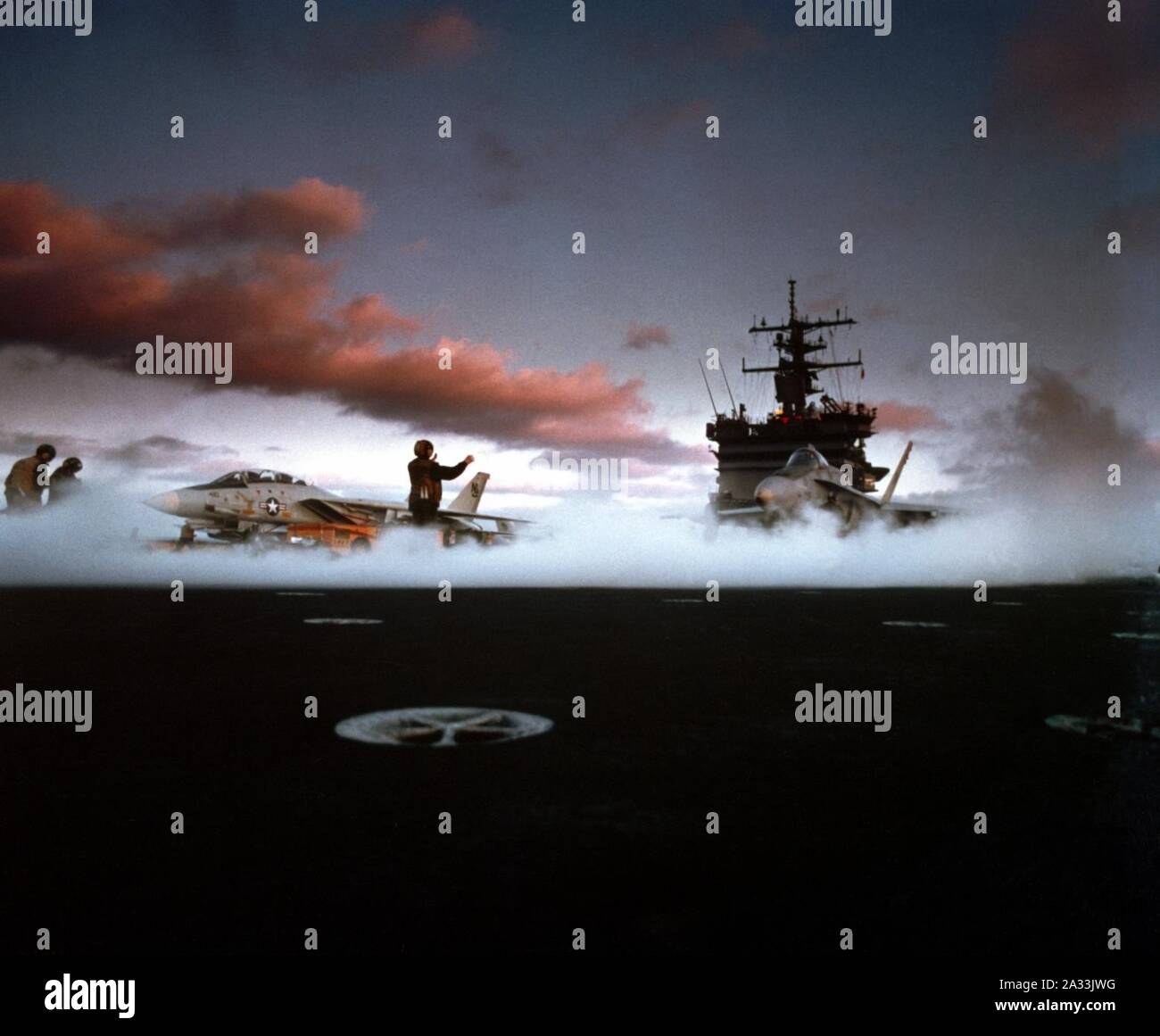 F-14 and F-18 prepare for launch Stock Photo - Alamy