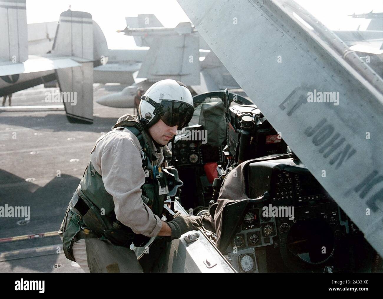F-14 Pilot Climbing into Cockpit Stock Photo - Alamy