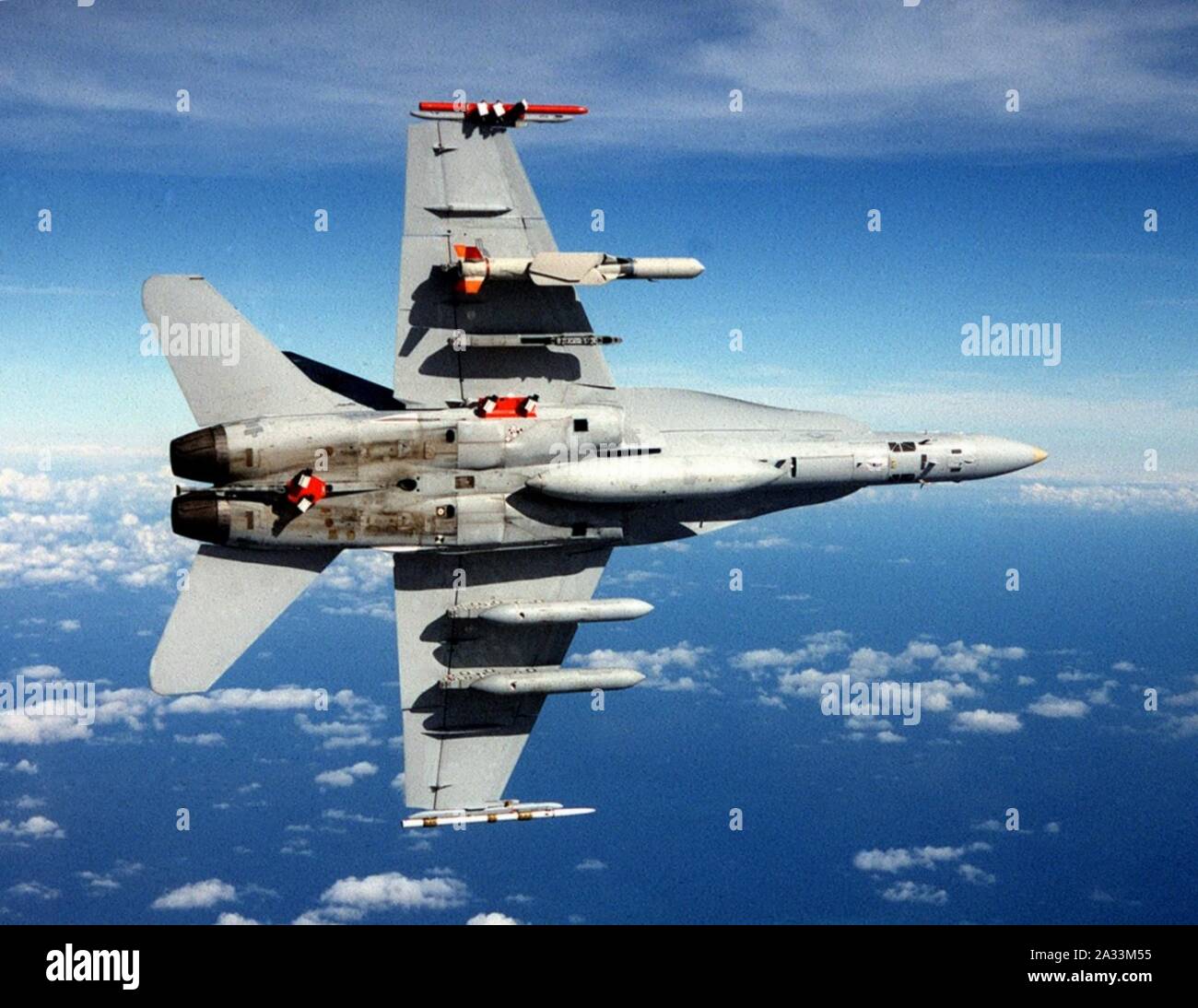 F-18C with SLAM-ER missile and AWW-13 pods in flight Stock Photo - Alamy