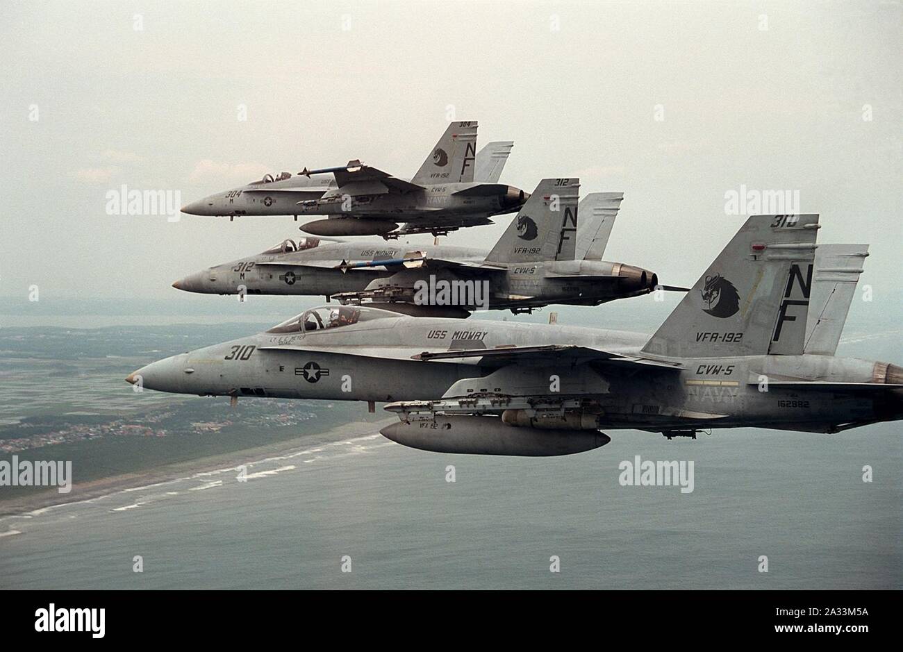 F-18As VFA-192 in flight 1989 Stock Photo - Alamy