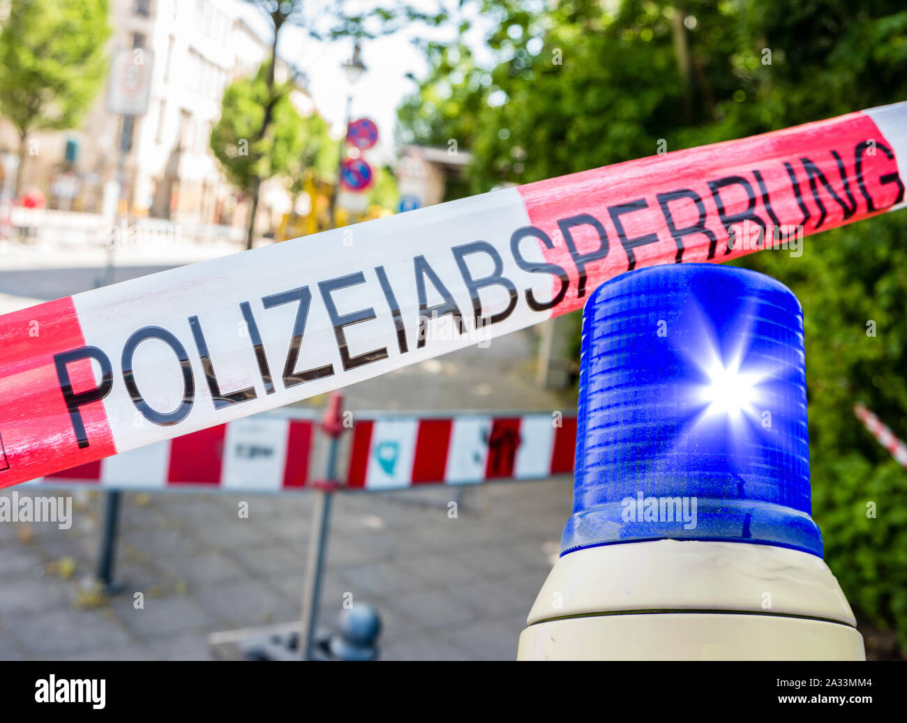 Police barrier blue light Stock Photo - Alamy