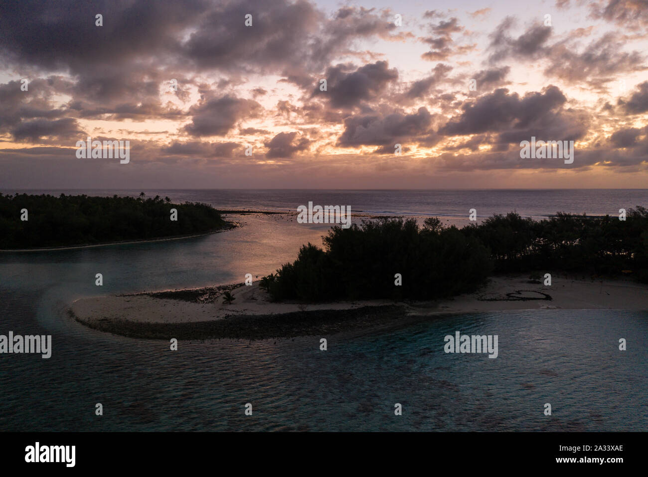 Stunning sunrise over the Muri beach and lagoon in Rarotonga in the ...
