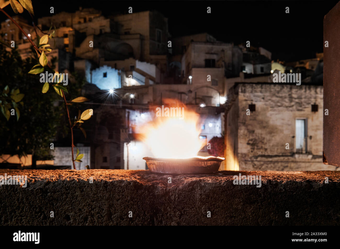 Decorated pots with fire at ancient city of Matera Decorated pots with ...