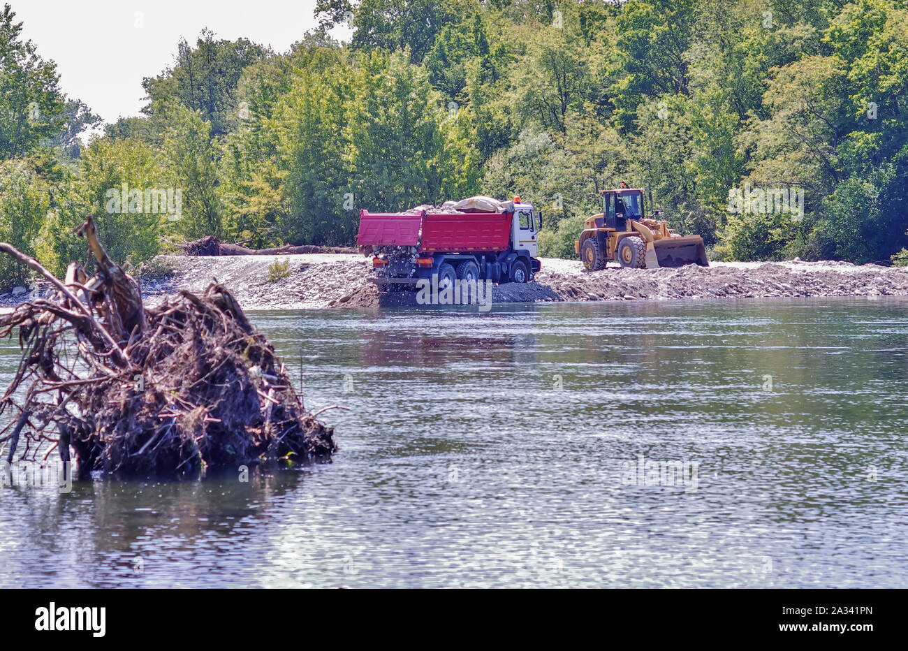 mechanical means at work to reinforce the river banks.Ticino park ...