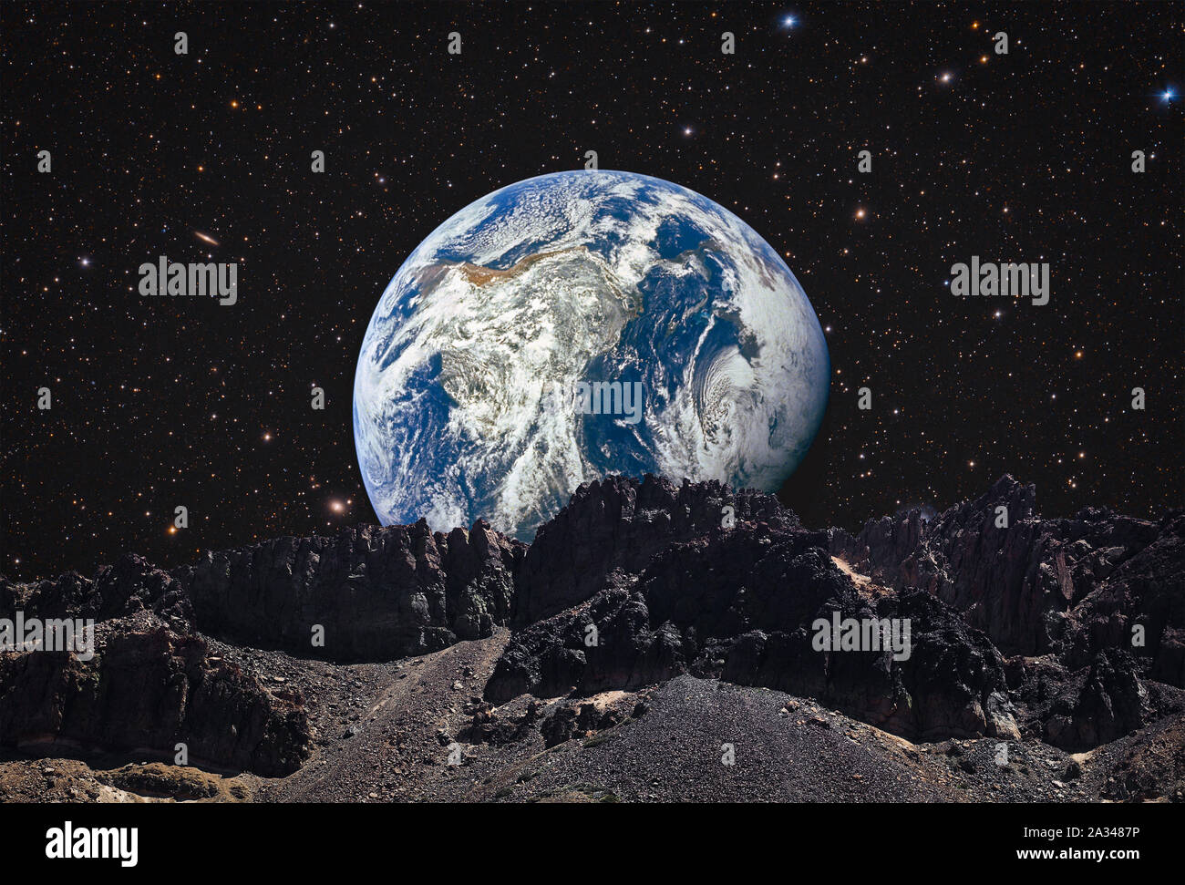 mountains on the moon overlooking planet earth. This image elements ...