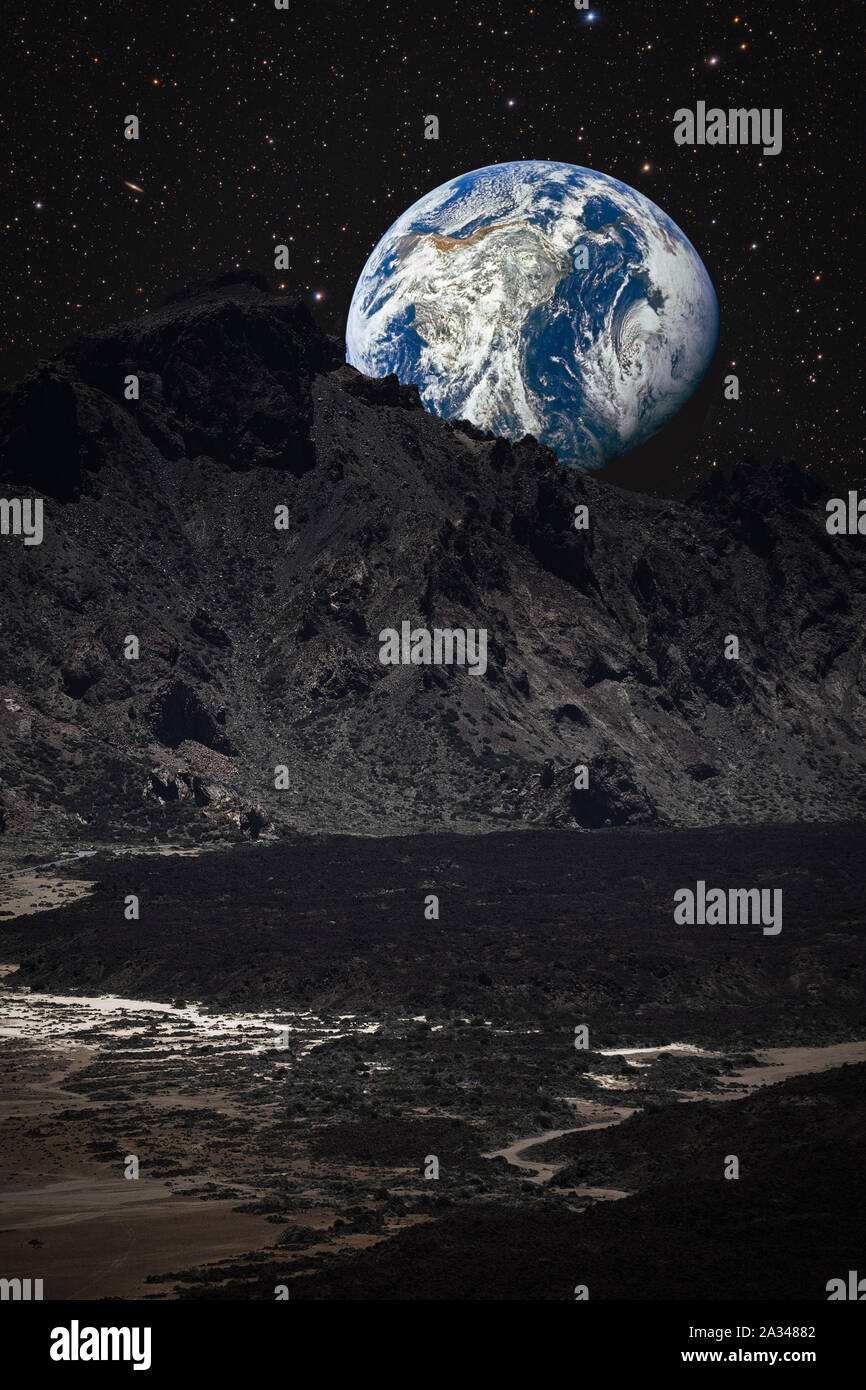 mountains on the moon overlooking planet earth. This image elements ...