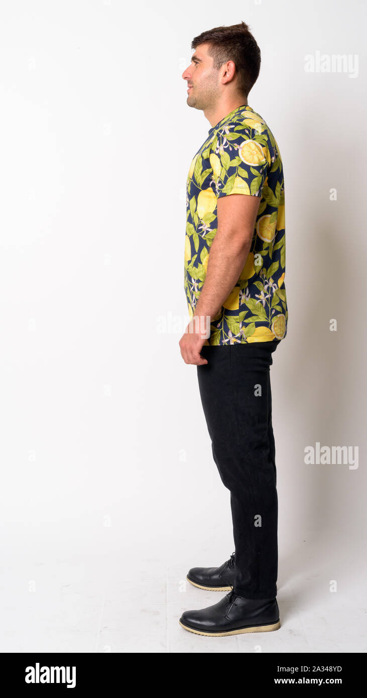 Full body shot profile view of young Persian man Stock Photo - Alamy
