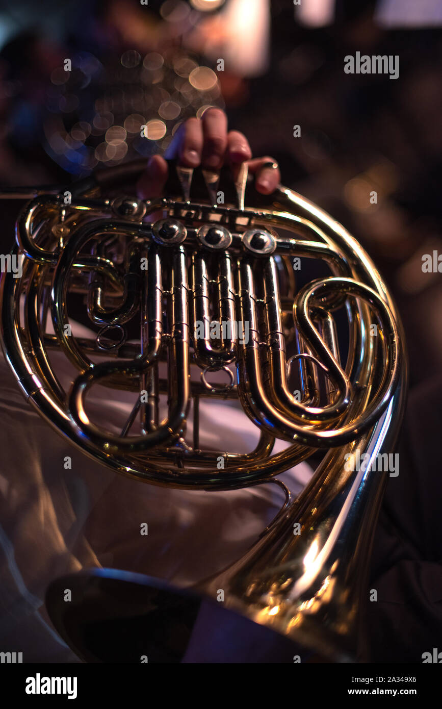 Man playing a horn hi-res stock photography and images - Alamy