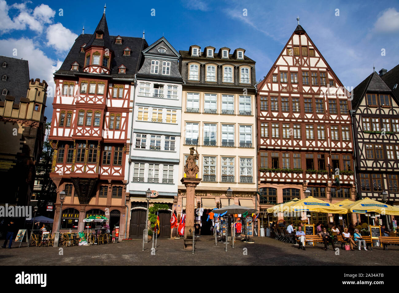 Historic buildings and street cafes in the Romerberg district of ...
