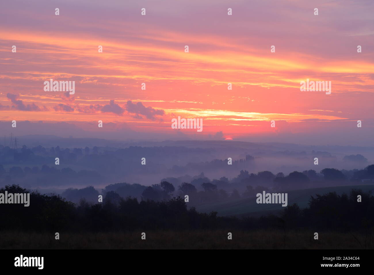 A view from Rothwell Country Park of the sun rising from the east ...
