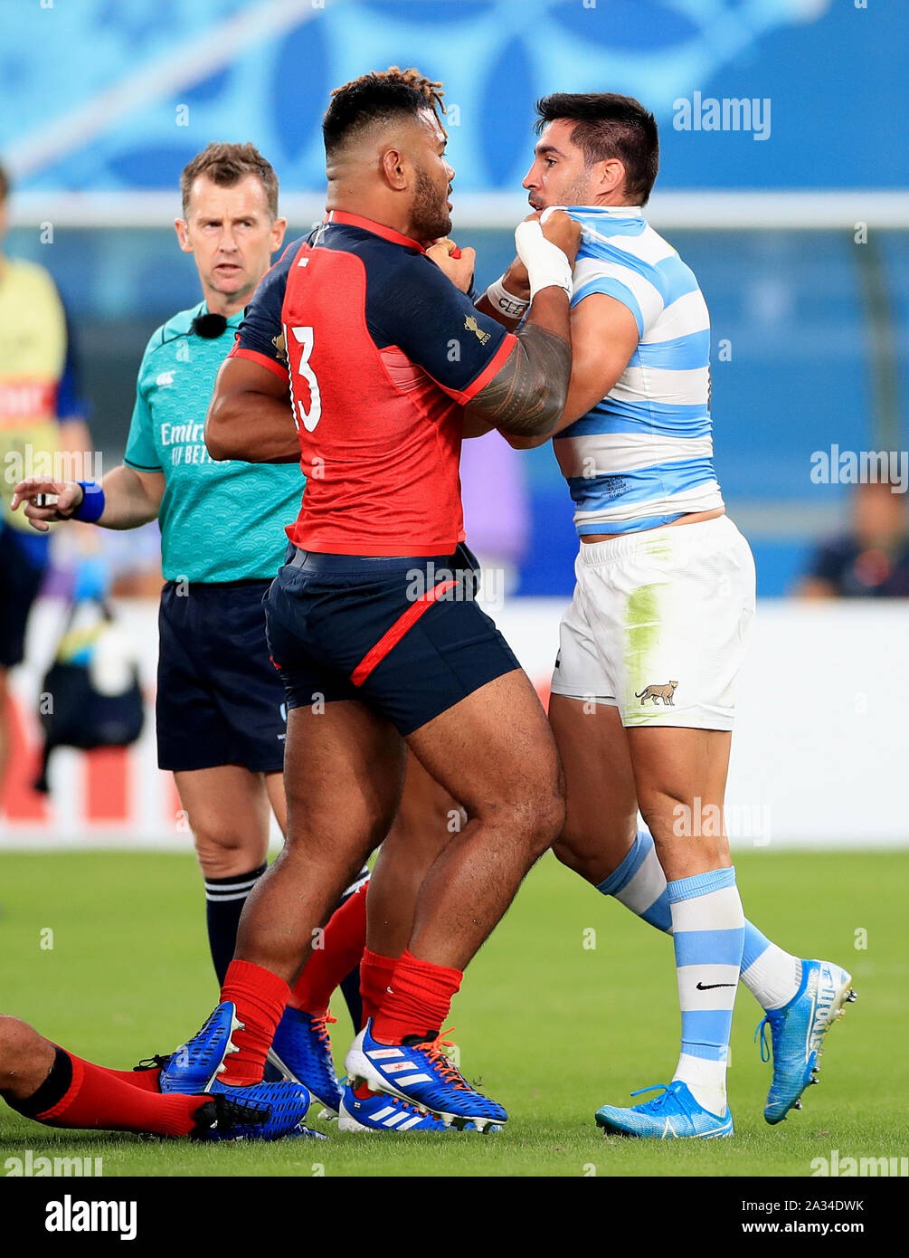 England's Manu Tuilagi (left) squares up to Argentina's Jeronimo De La ...