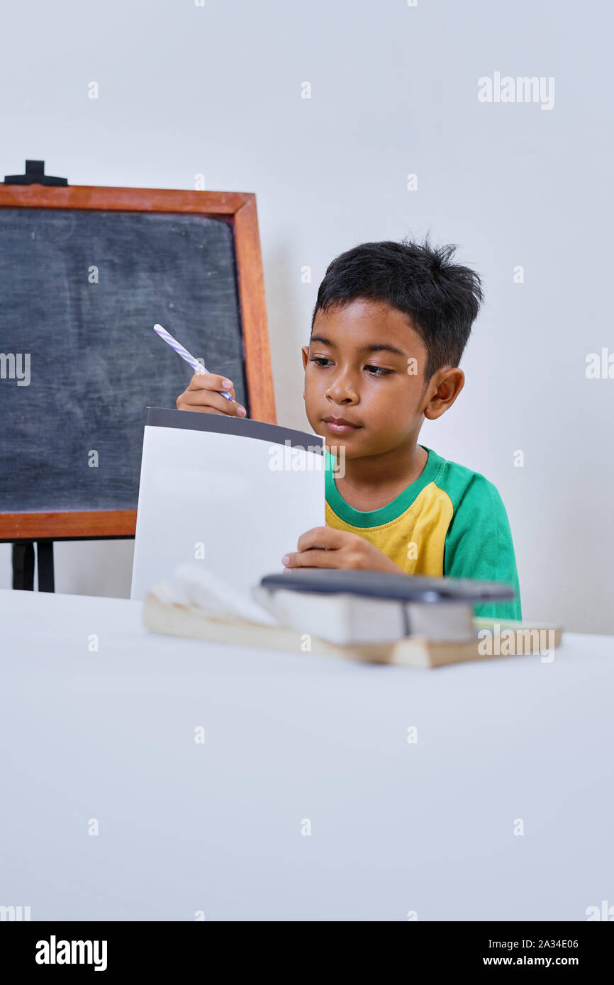 Indian school student writing exam hi-res stock photography and images ...