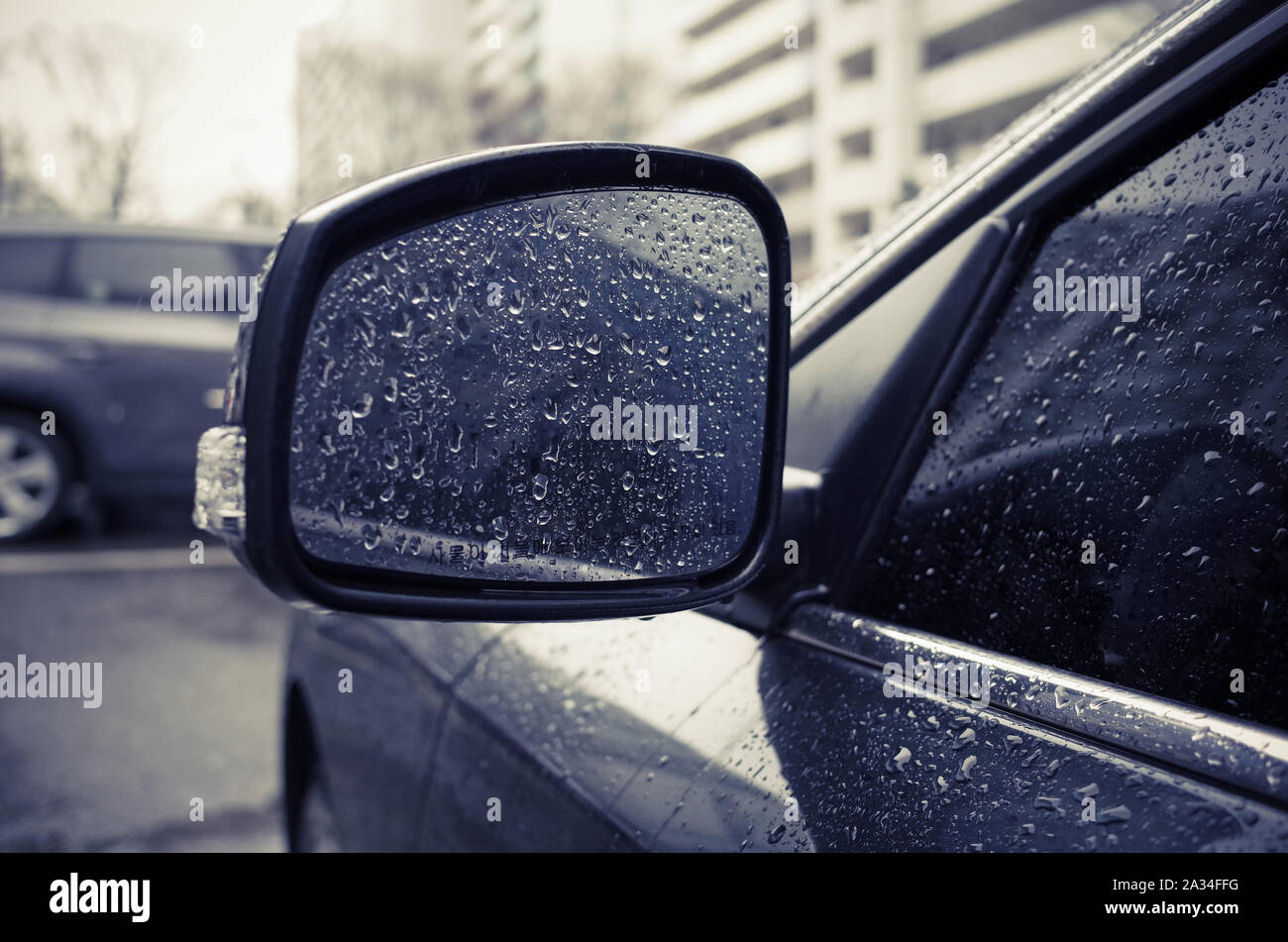 Rear mirror in rain hi-res stock photography and images - Alamy