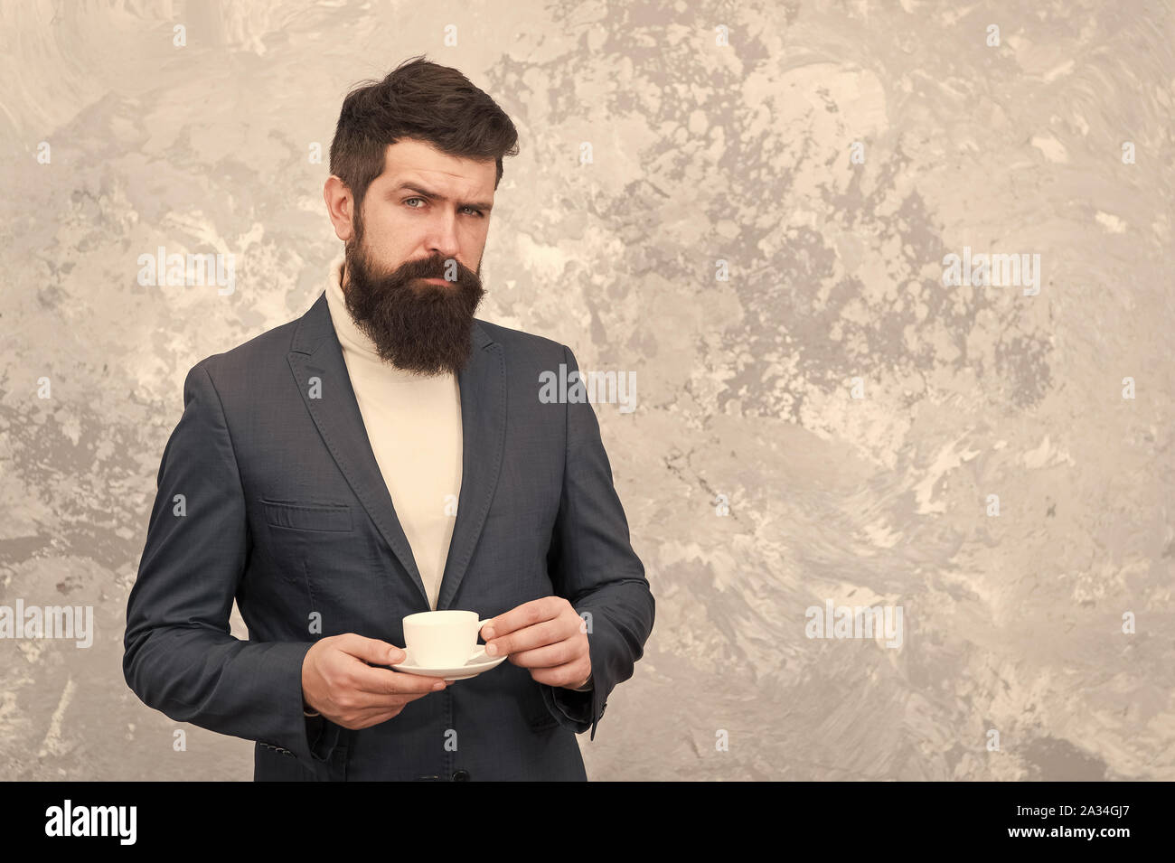 Specialty coffee. Man handsome bearded businessman hold cup of coffee ...