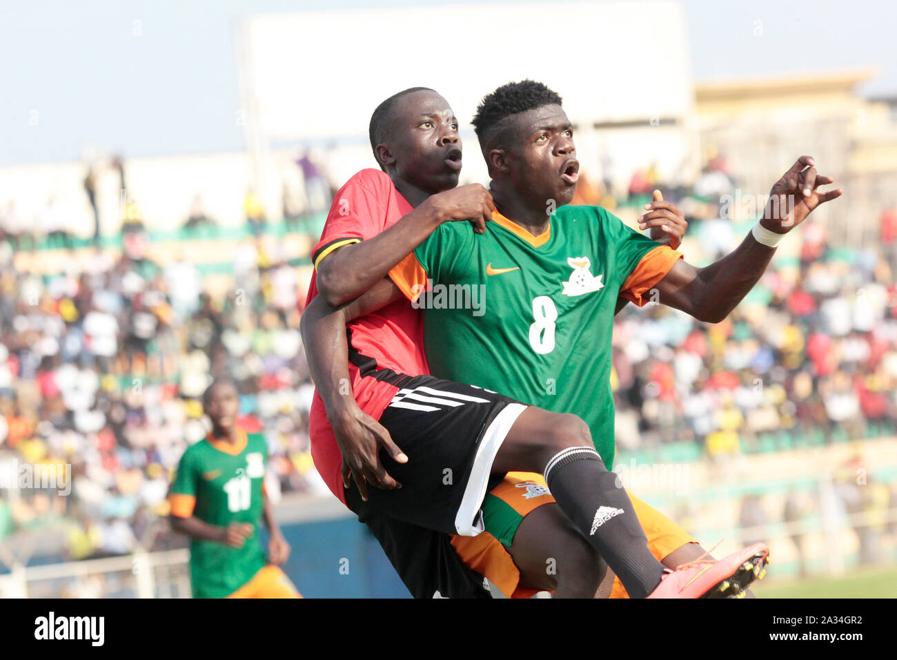 A Zambian players takes charge against Uganda Cranes during a Cup of ...