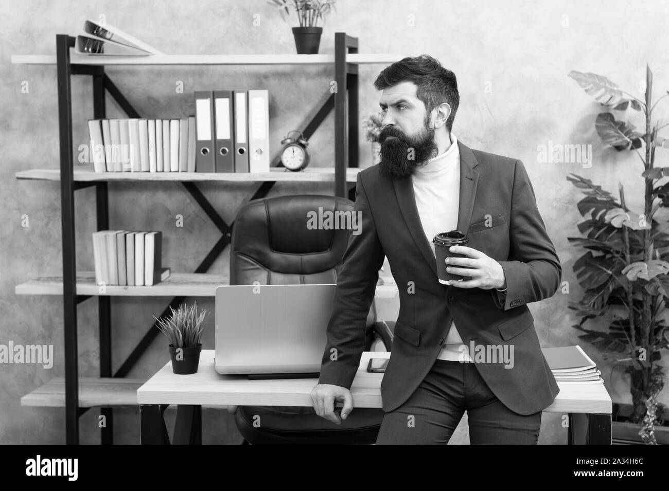 Relaxed top manager drinking coffee. Man bearded manager businessman ...