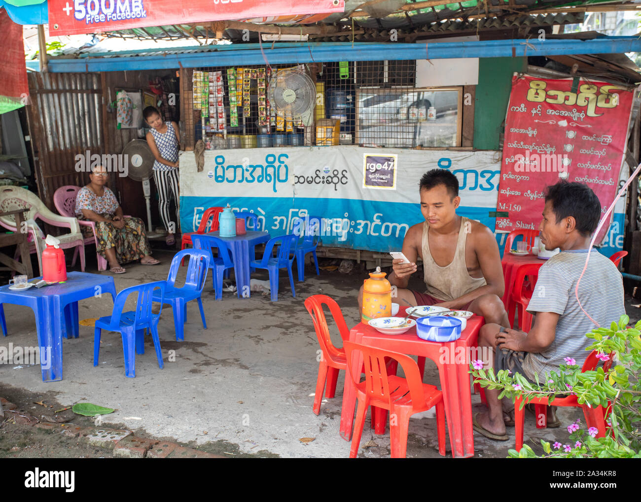 People having meal in traditional burmese reastuarant. Traditional ...