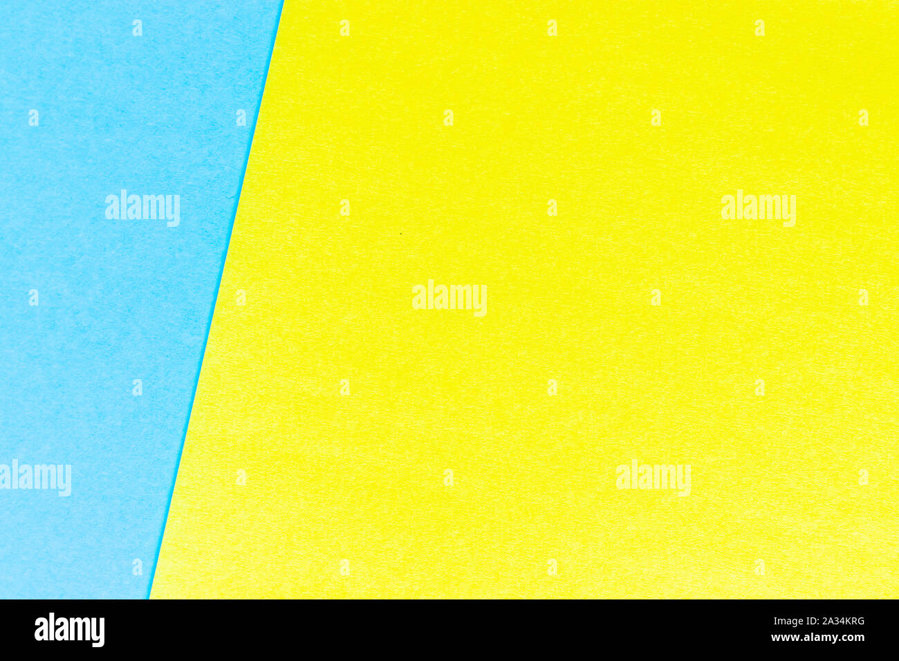 Abstract yellow and light blue color paper textured background with ...