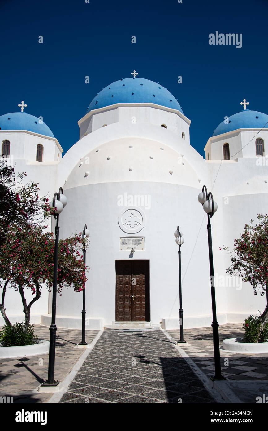 The blue domed building of Holy Cross Church in Perissa Stock Photo - Alamy