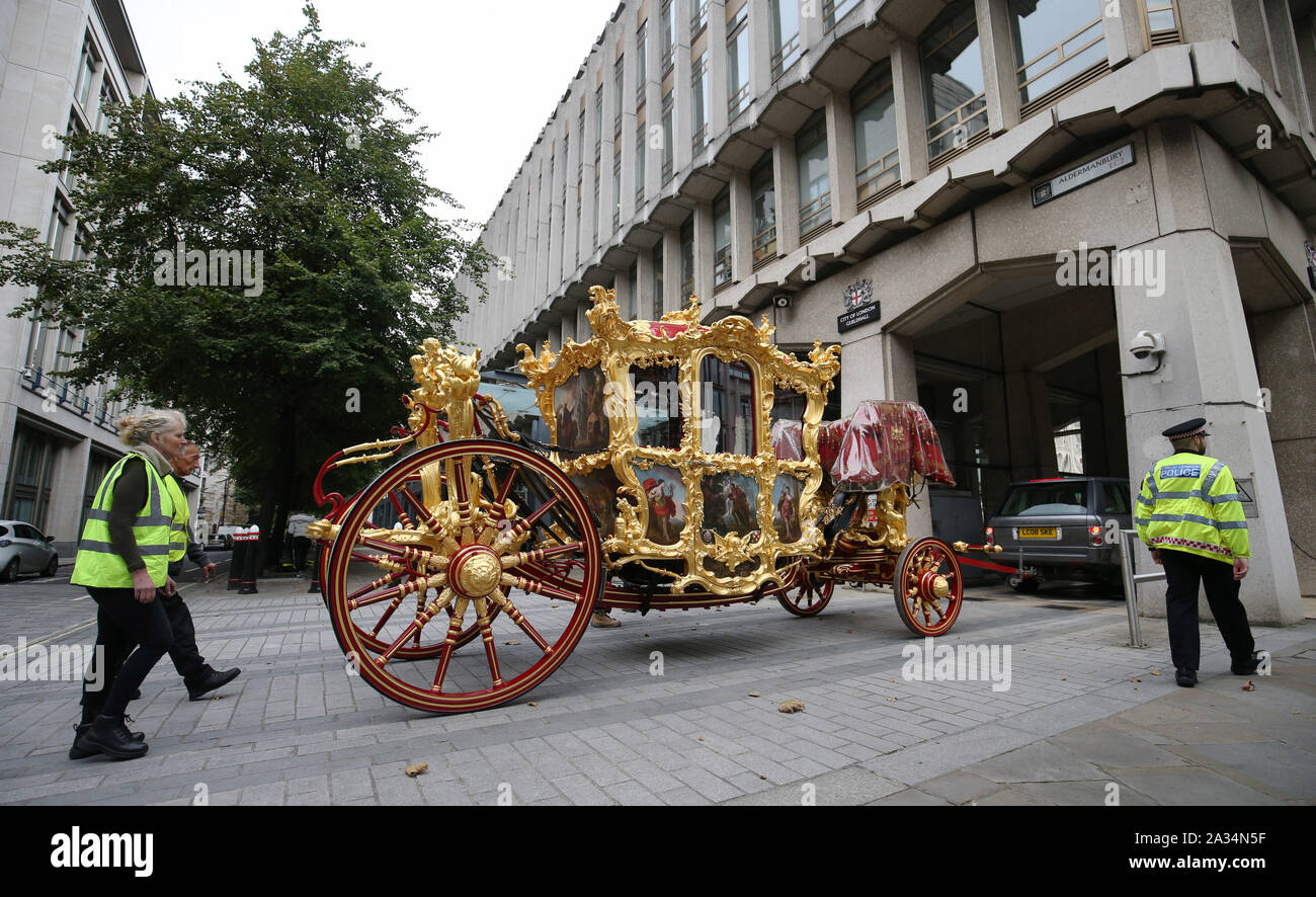 Employees from Croford Coachbuilders manoeuvre the State Coach into ...