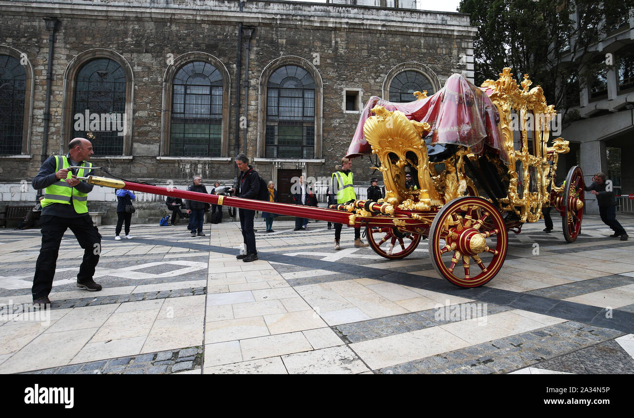 Employees from Croford Coachbuilders manoeuvre the State Coach into ...