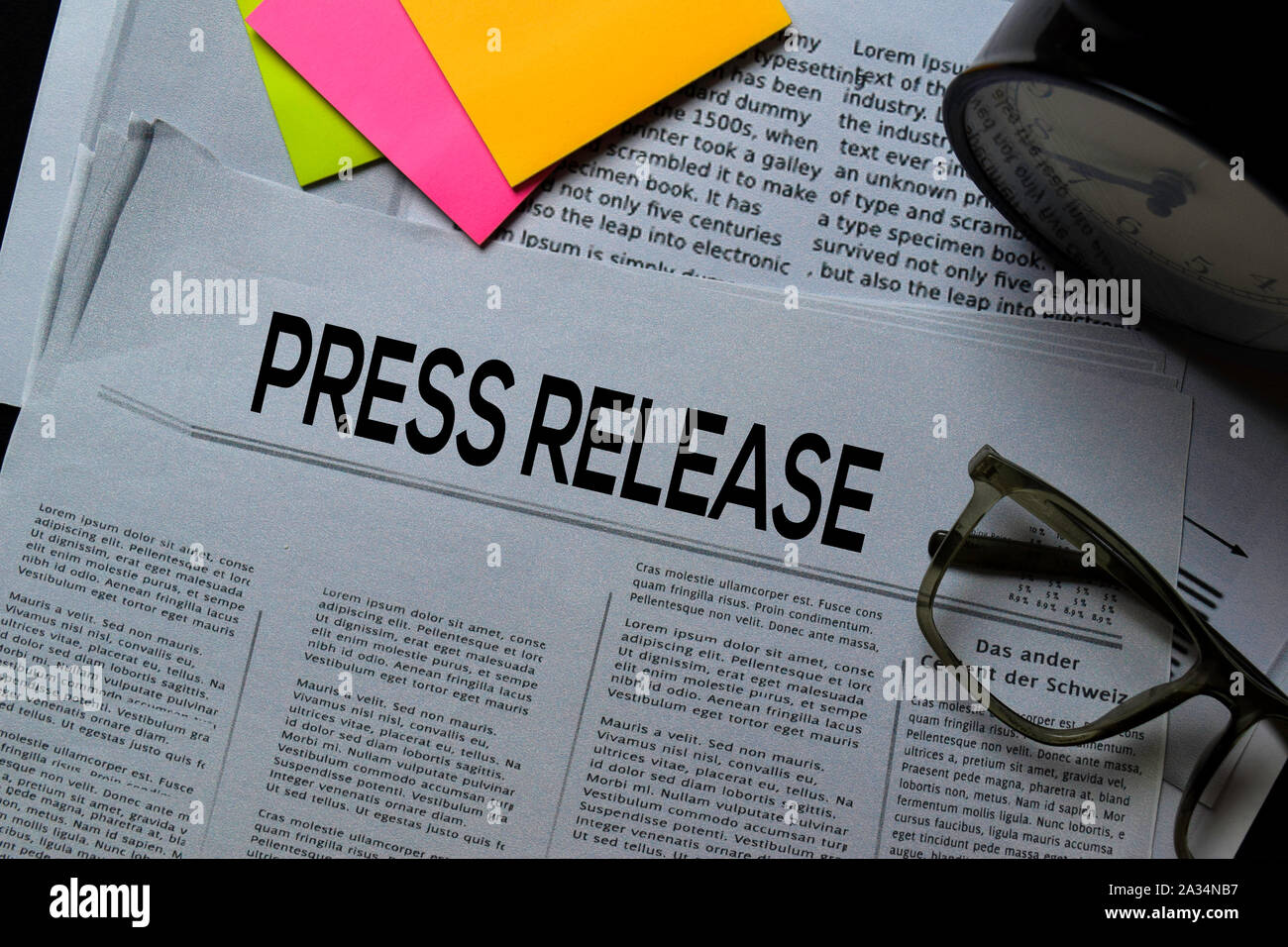 Press Release text in headline isolated on office desk. Newspaper ...