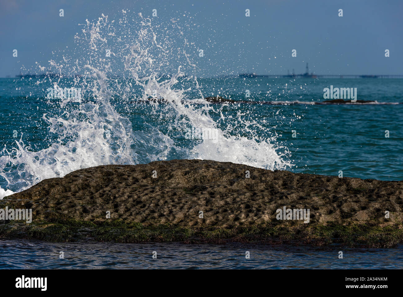 Breaking big waves rocky seashore hi-res stock photography and images ...