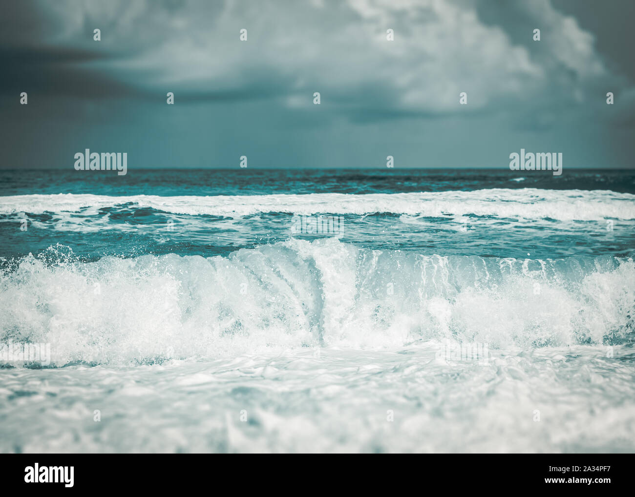 Strong wave in the sea during rainy season Stock Photo - Alamy