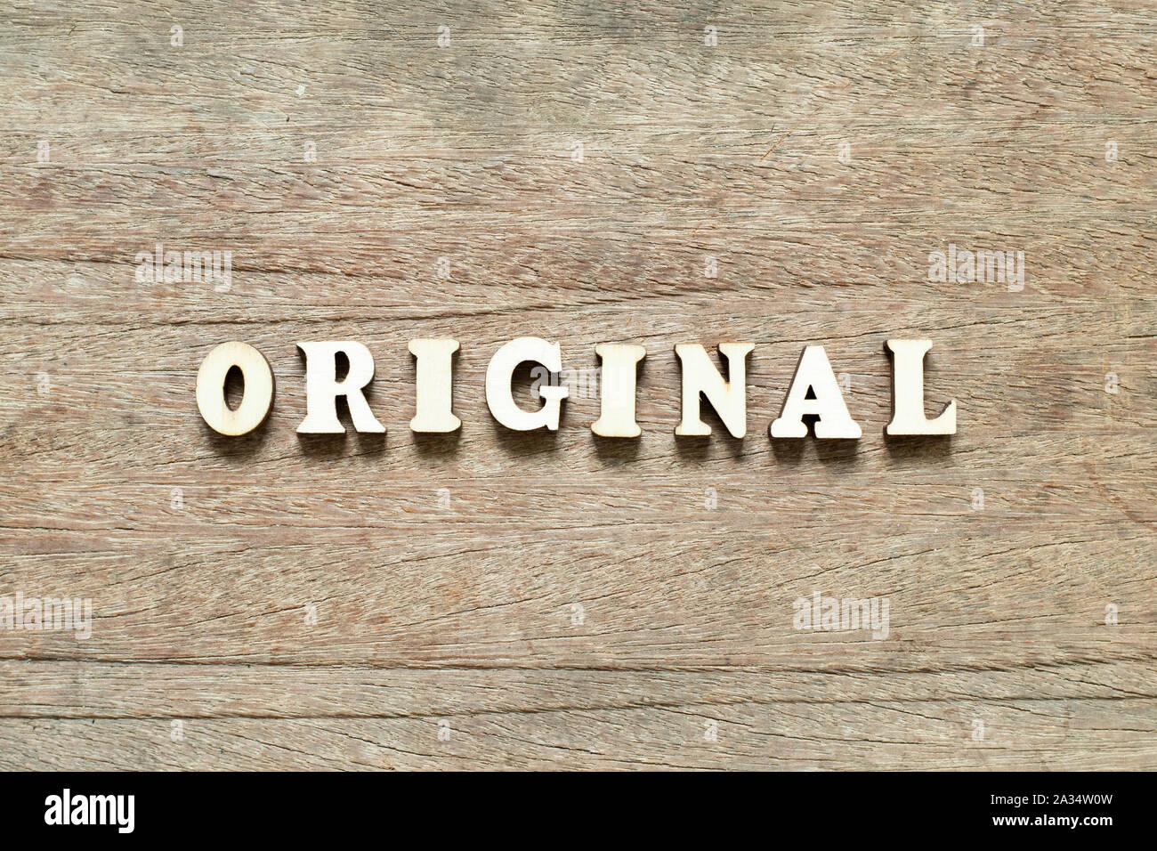 Letter block in word original on wood background Stock Photo - Alamy