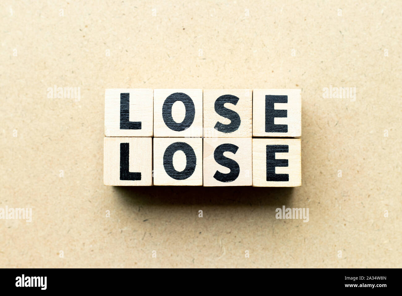 Letter block in word lose lose on wood background (Concept for game ...