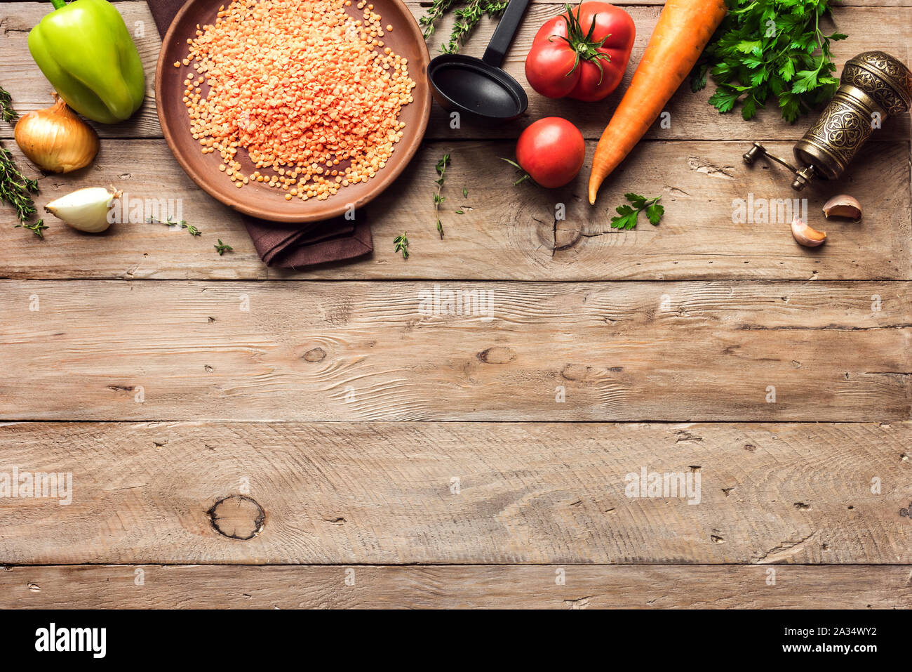 Cooking background with red lentil, seasonal organic vegetables on ...
