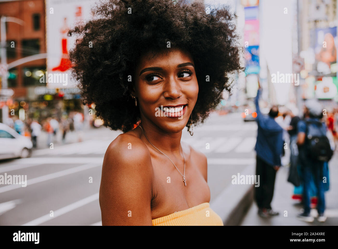 Young beautiful girl walking in Time square, manhattan. Lifestyle ...