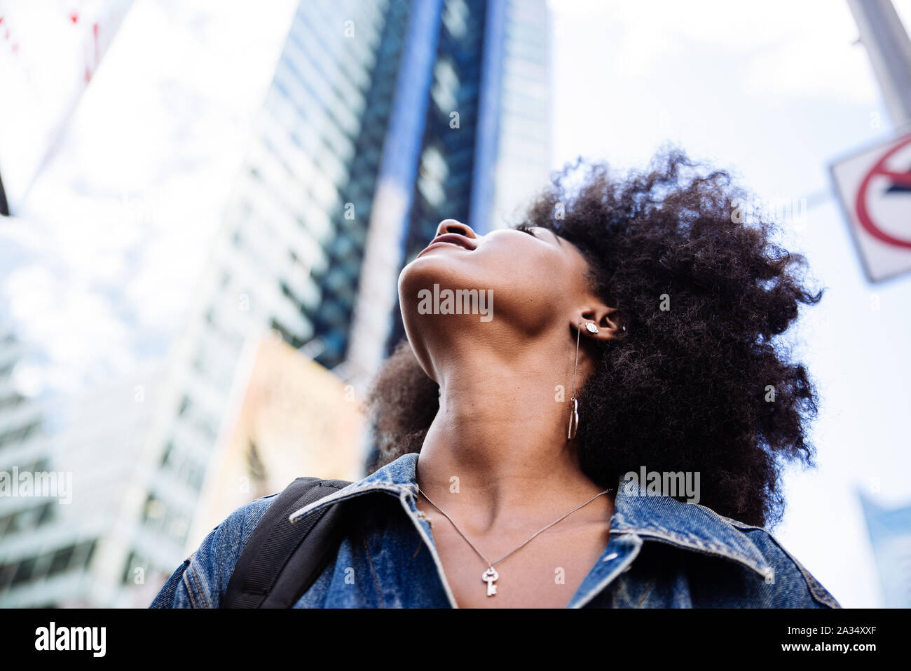 Young beautiful girl walking in Time square, manhattan. Lifestyle ...