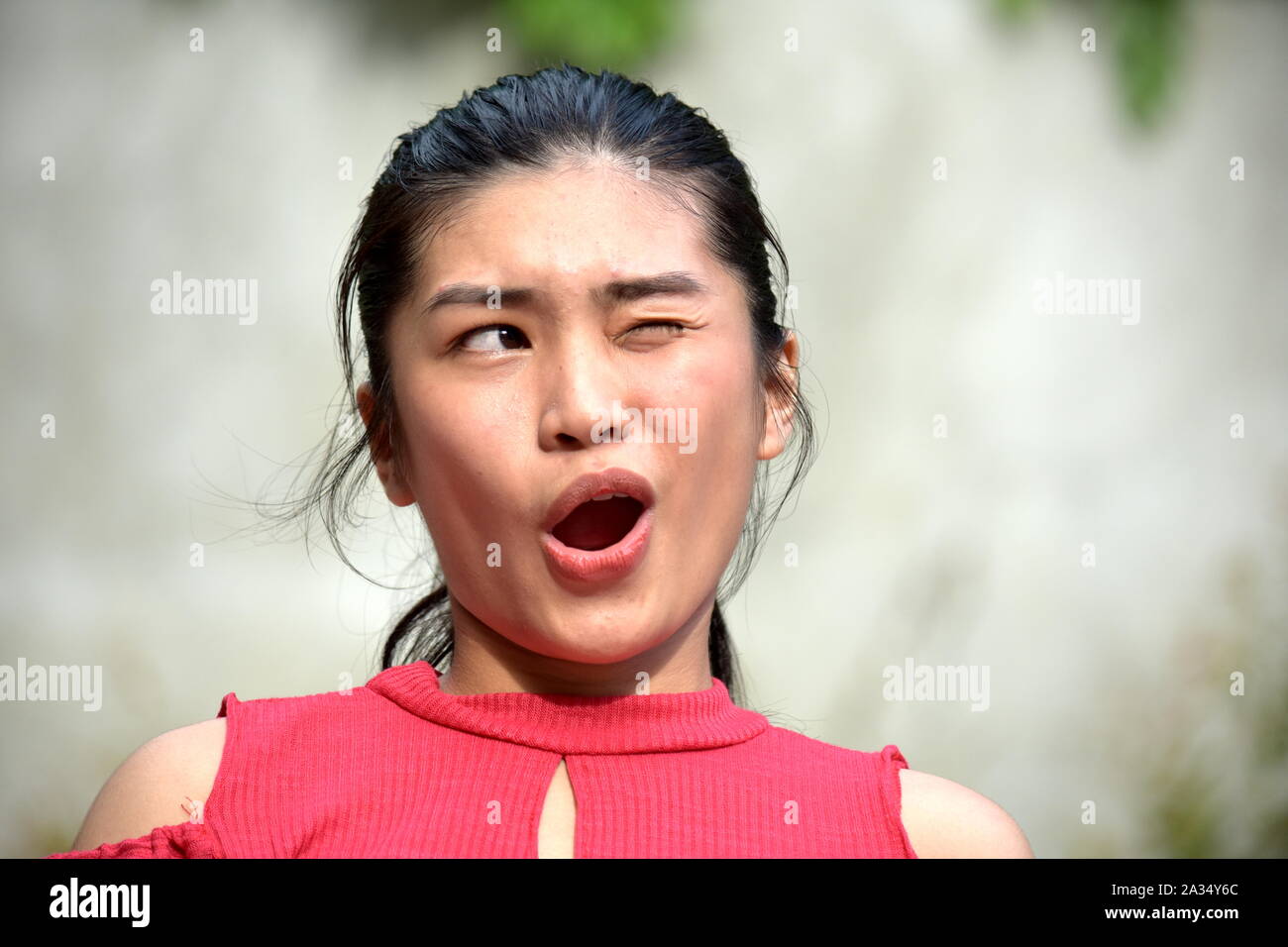 A Beautiful Diverse Girl Winking Stock Photo - Alamy