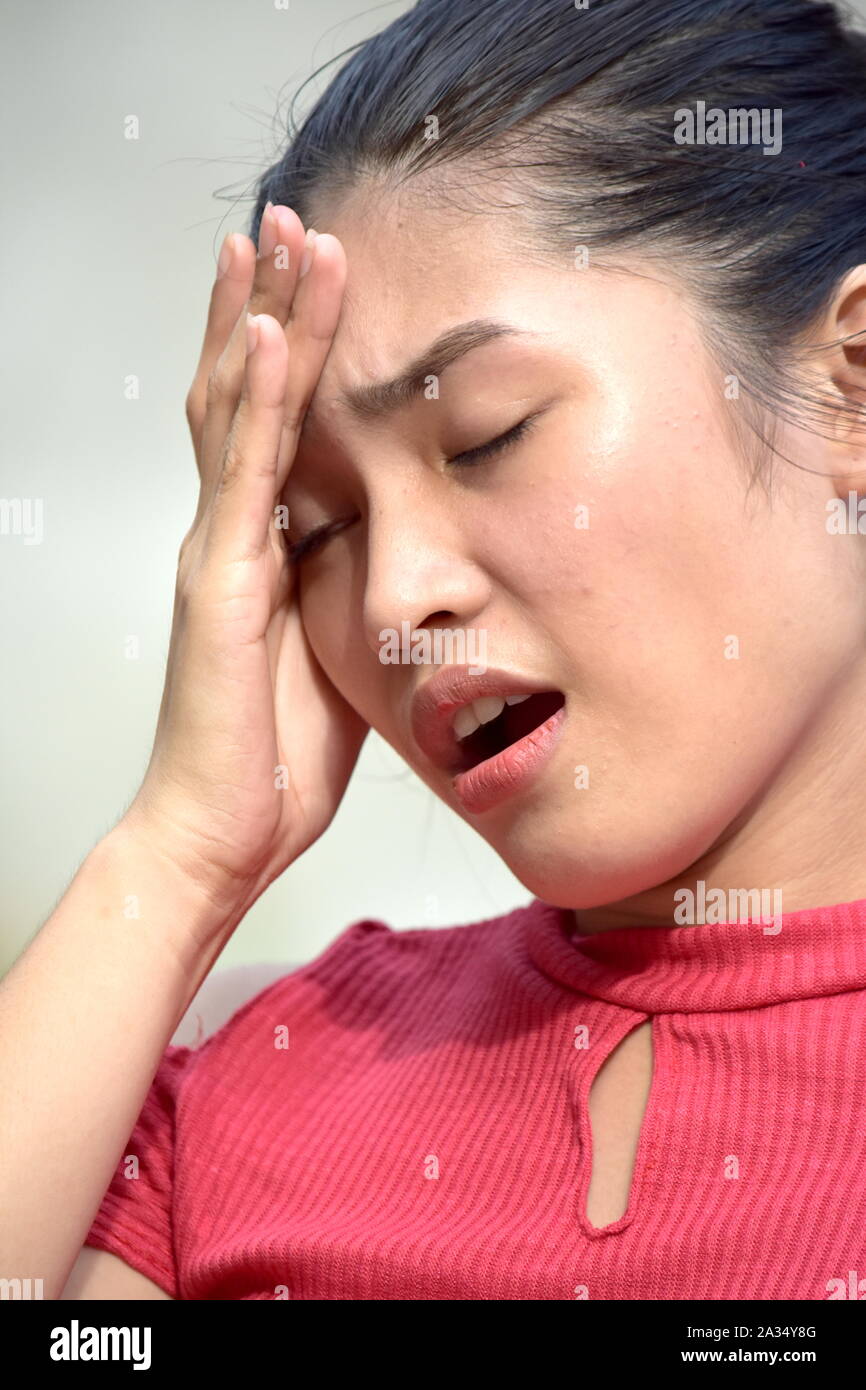 A Stressed Beautiful Asian Female Stock Photo - Alamy
