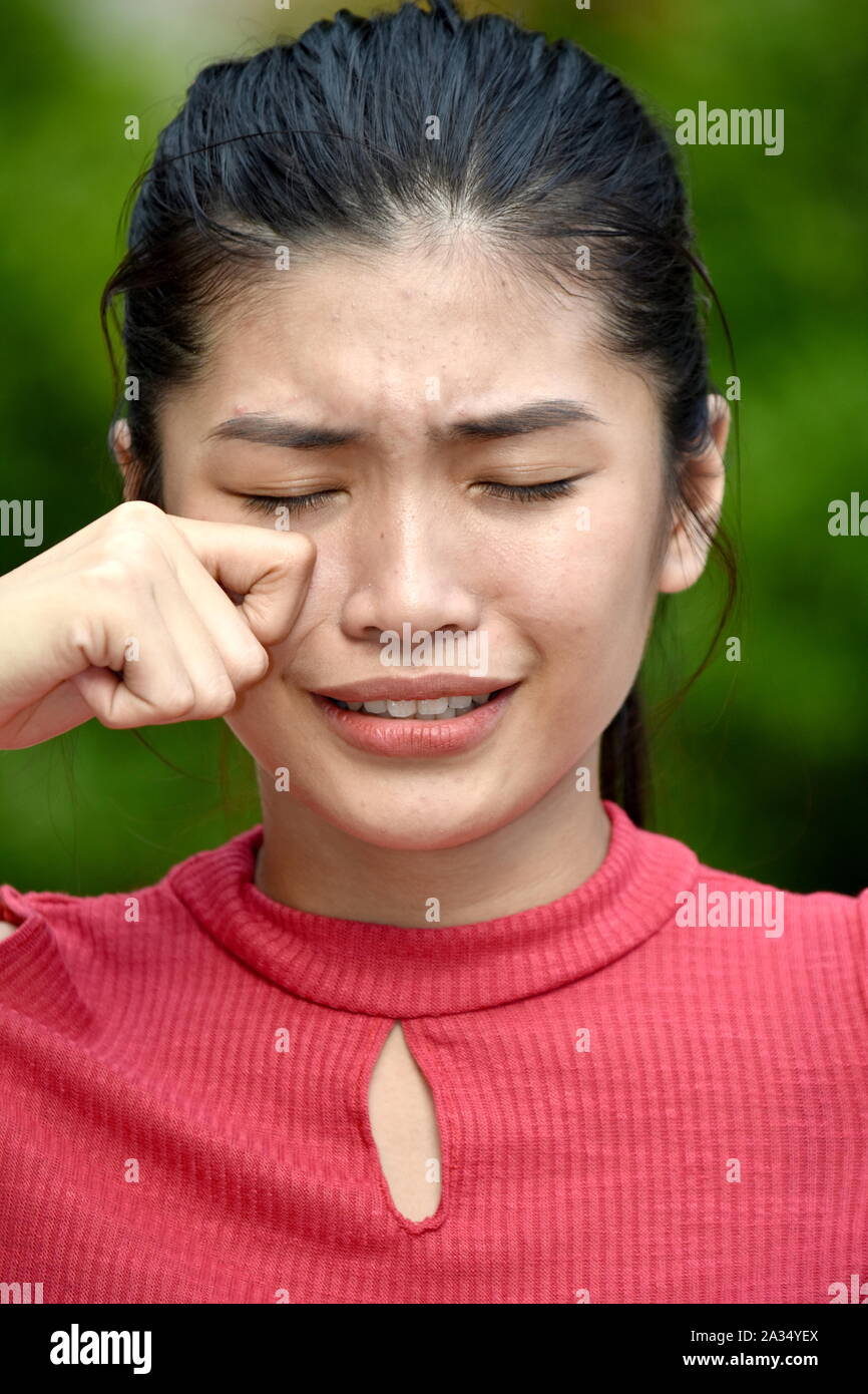 A Crying Youthful Diverse Female Juvenile Stock Photo - Alamy