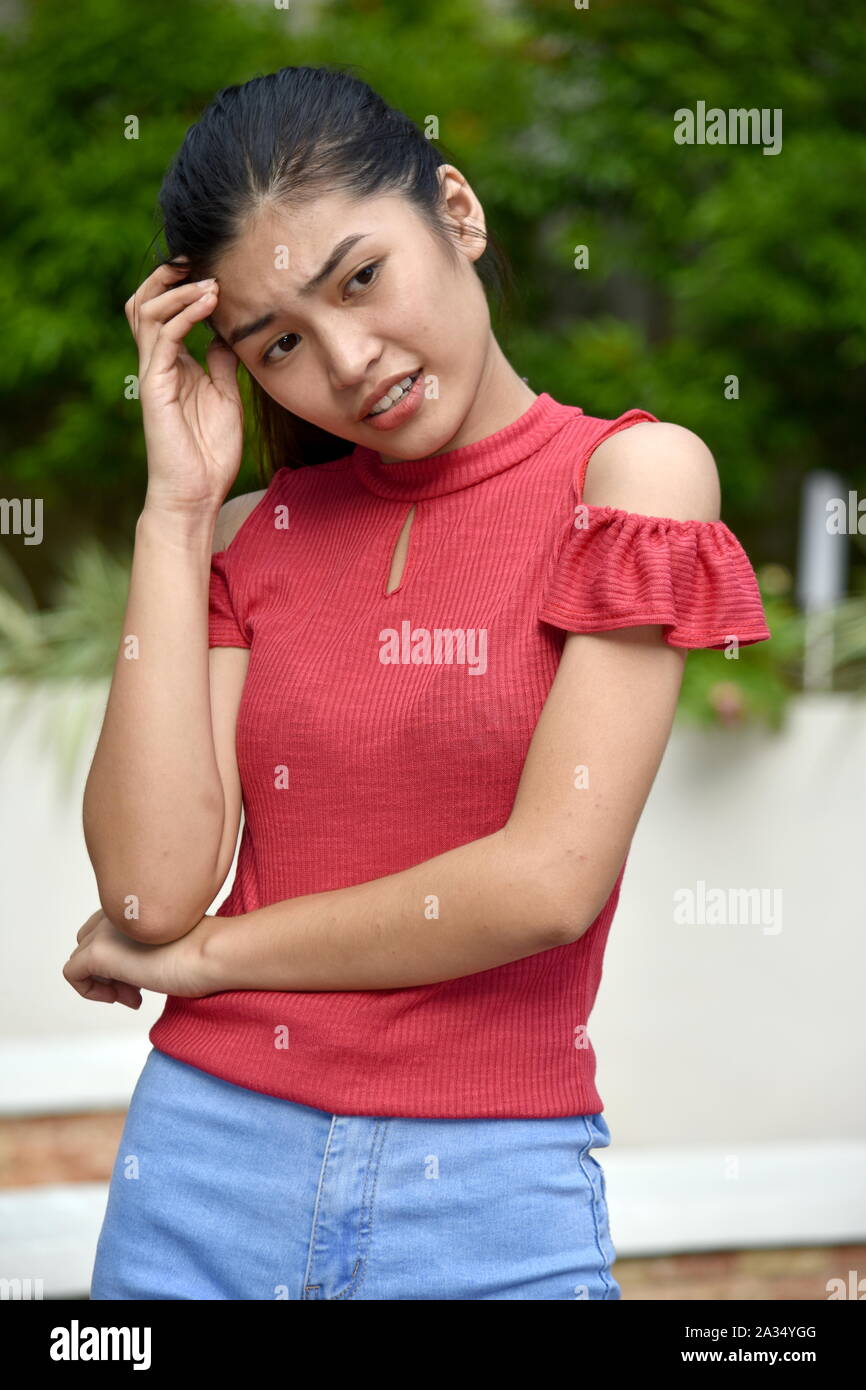 A Beautiful Filipina Girl Thinking Stock Photo - Alamy
