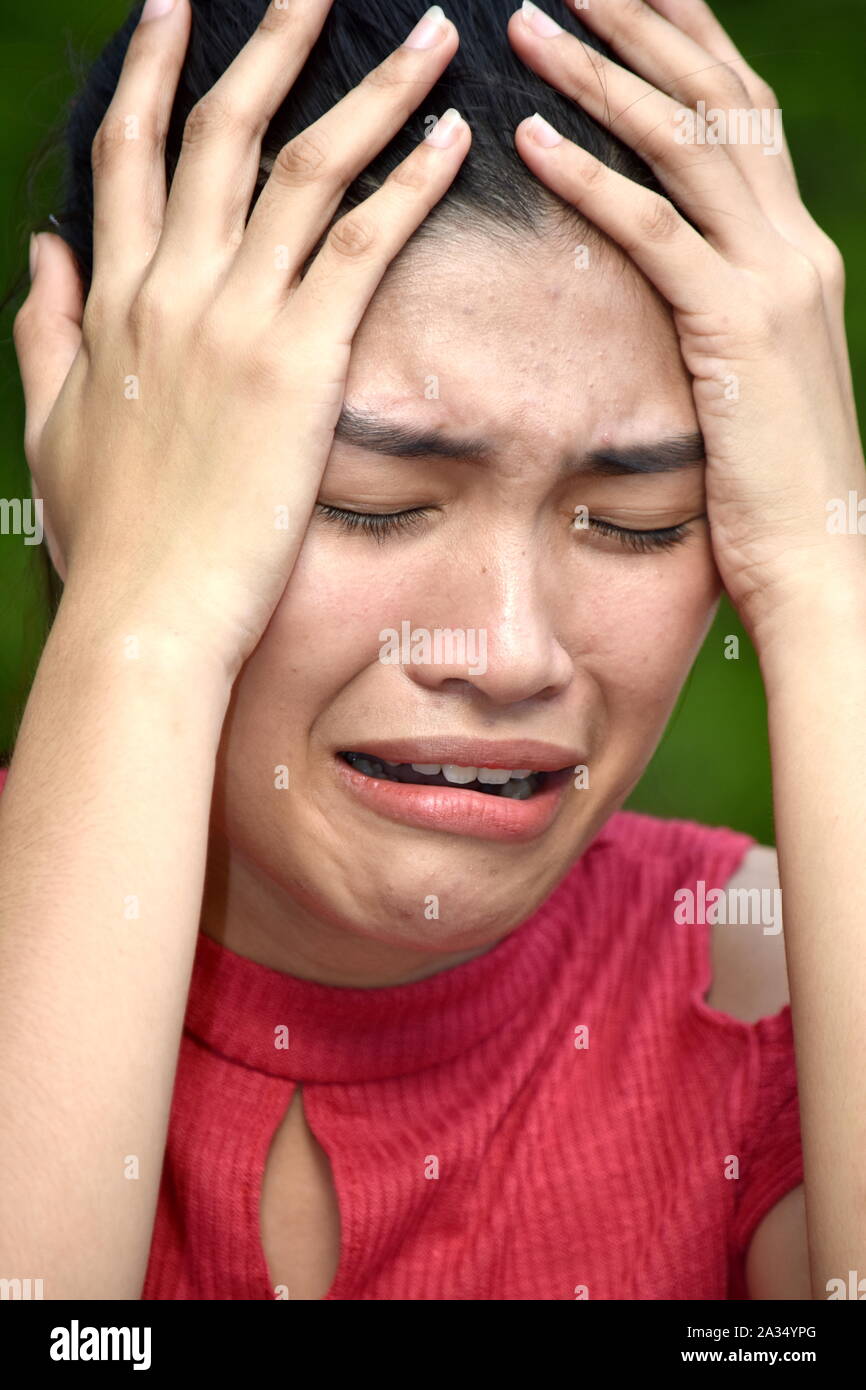 A Stressful Youthful Diverse Girl Stock Photo - Alamy