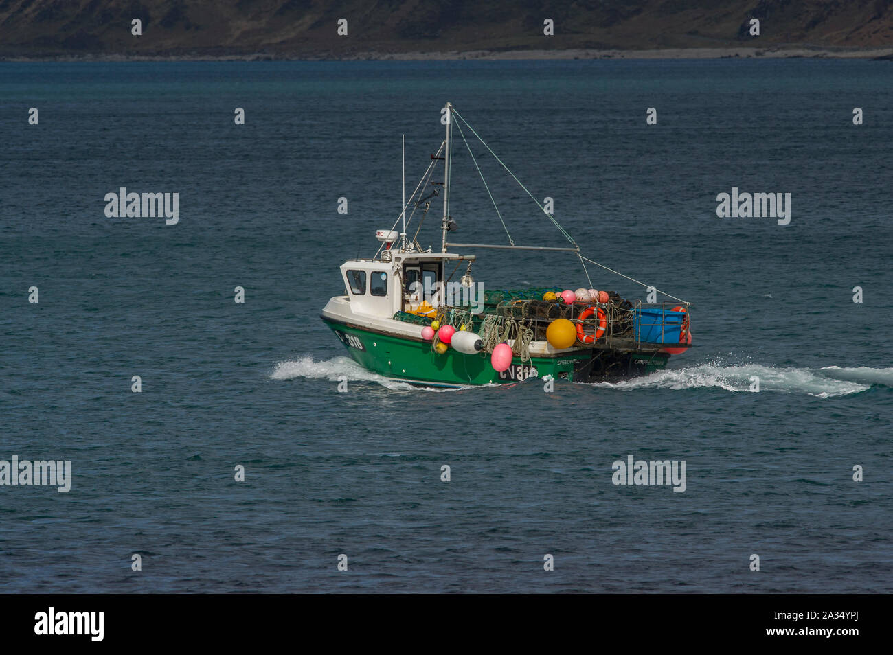 Fishing boat in the Sound of Islay, Isle of Islay, Inner Hebrides ...