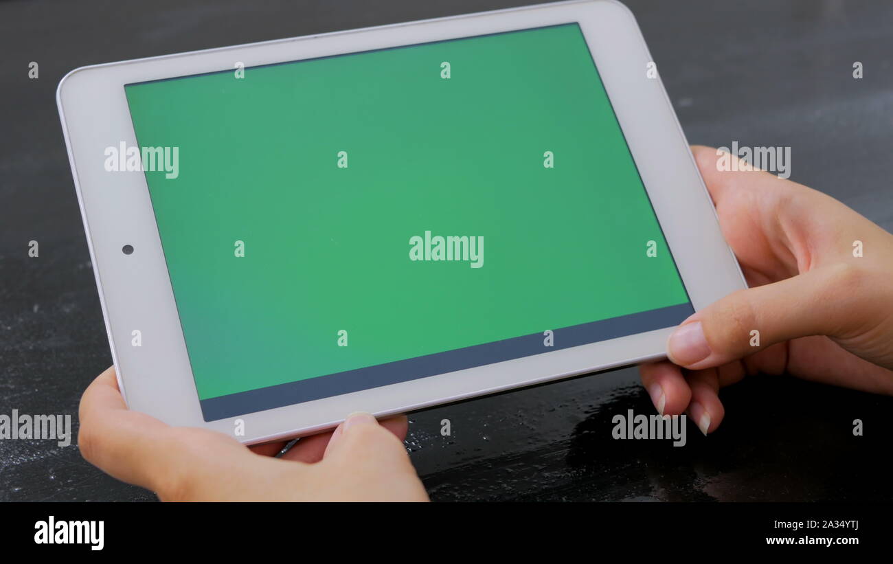 Horizontal green screen chroma tablet hi-res stock photography and ...