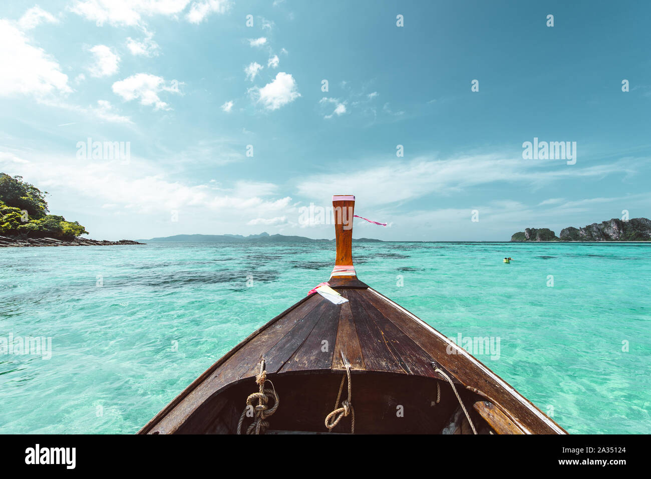Long tail boat front with beautiful clear sea of thailand Stock Photo ...
