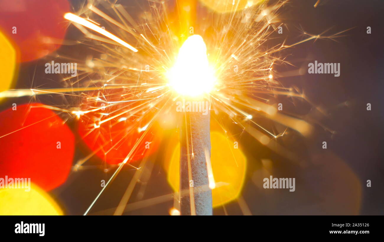Firework sparkler burning Stock Photo - Alamy