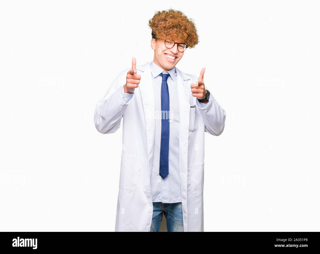 Young handsome scientist man wearing glasses pointing fingers to camera ...