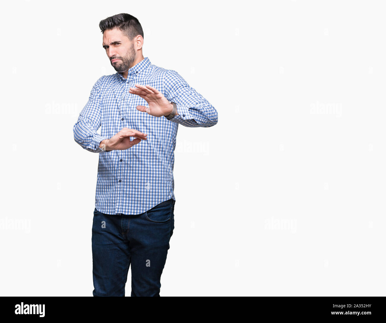 Young handsome man over isolated background disgusted expression ...