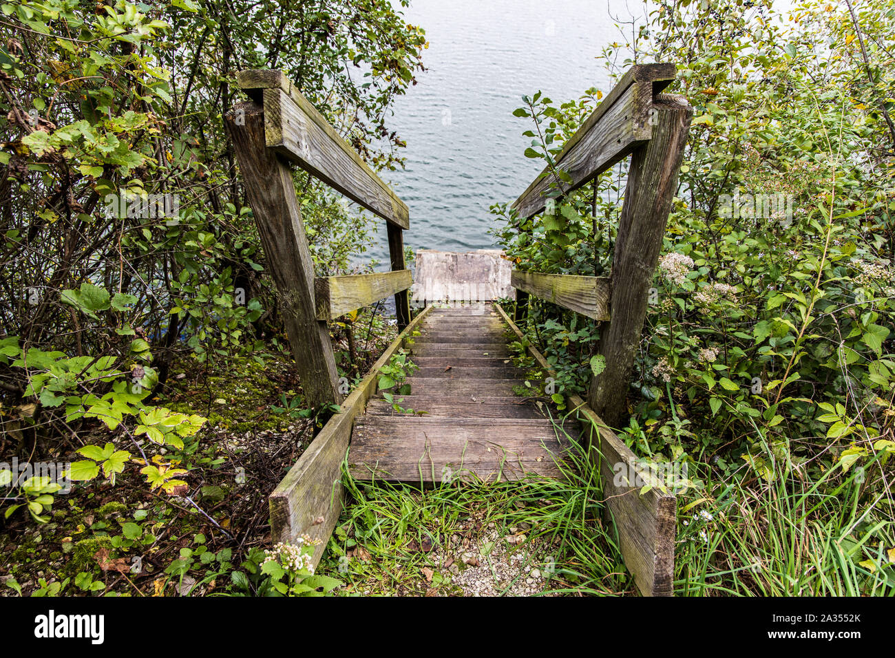Steep steps to lake Stock Photo - Alamy