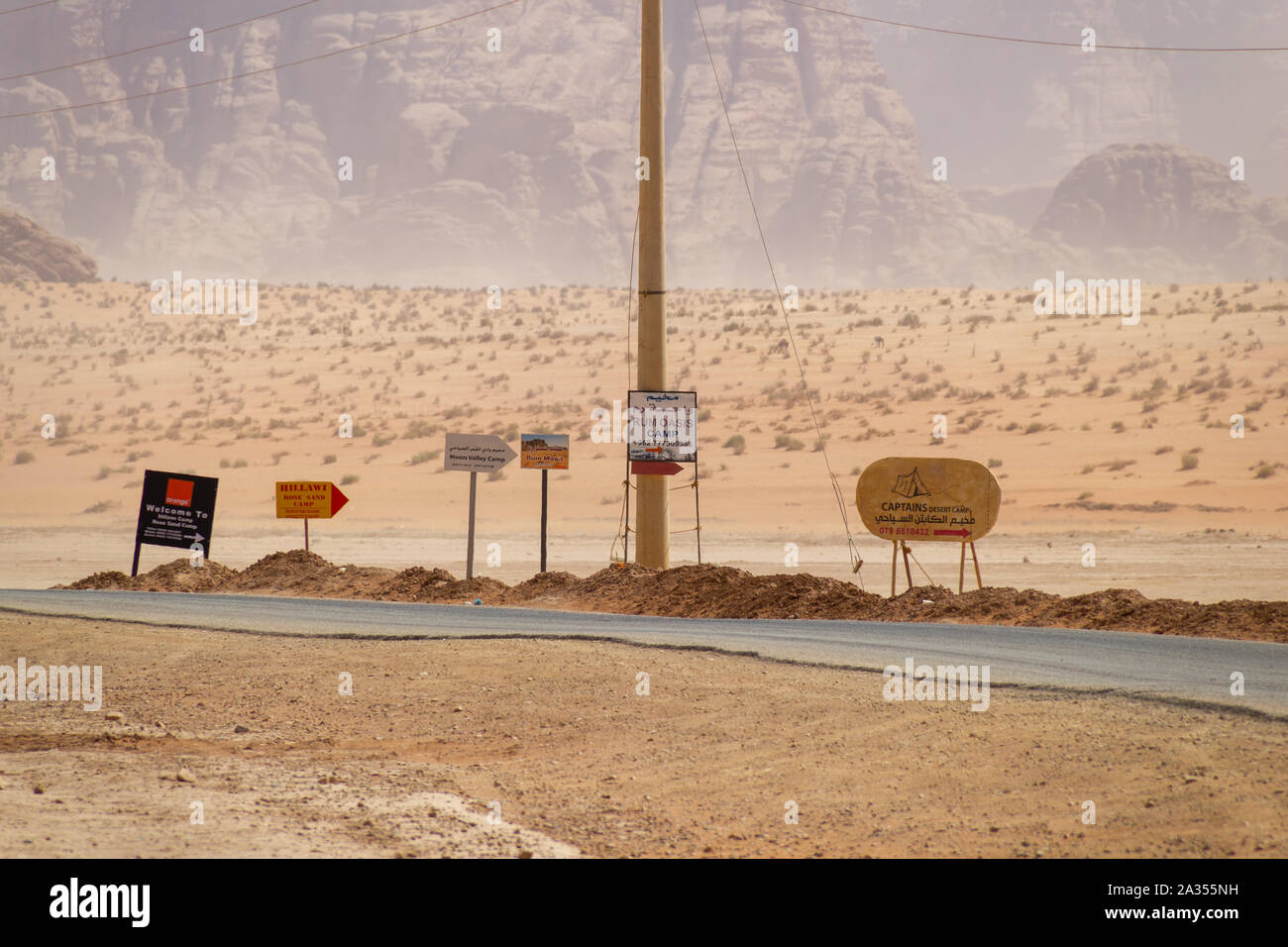Wadi Rum, Jordan - Sept 22, 2013: Several camping signs beside a road ...