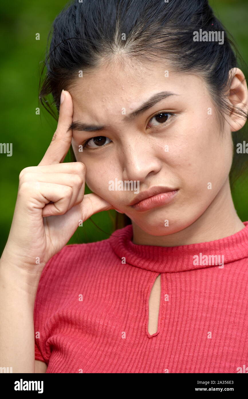 An A Young Girl Thinking Stock Photo - Alamy