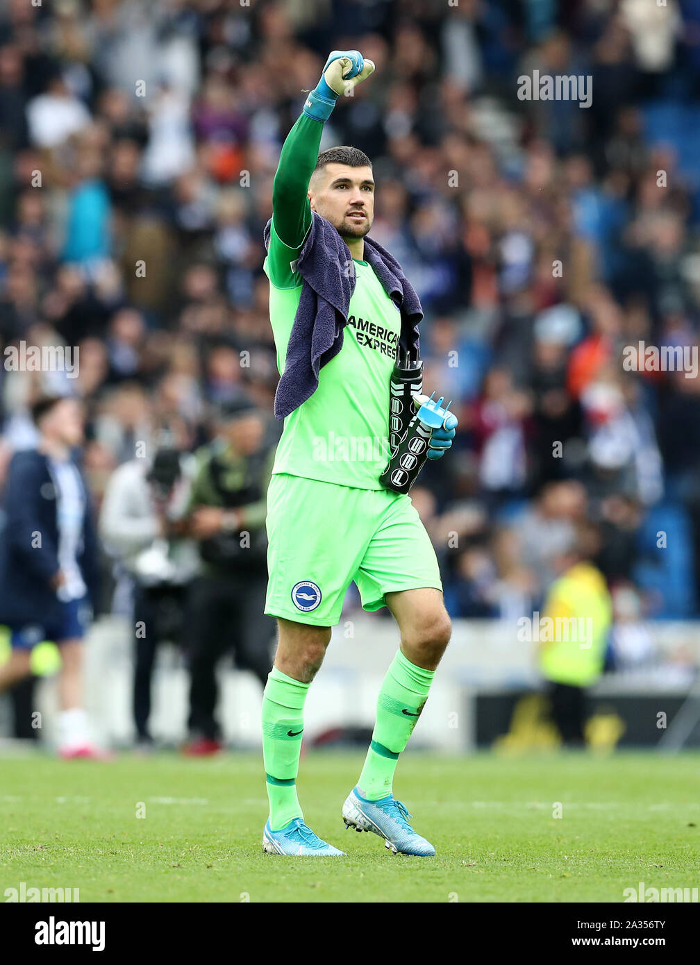 Brighton and Hove Albion goalkeeper Mathew Ryan acknowledges fans after ...