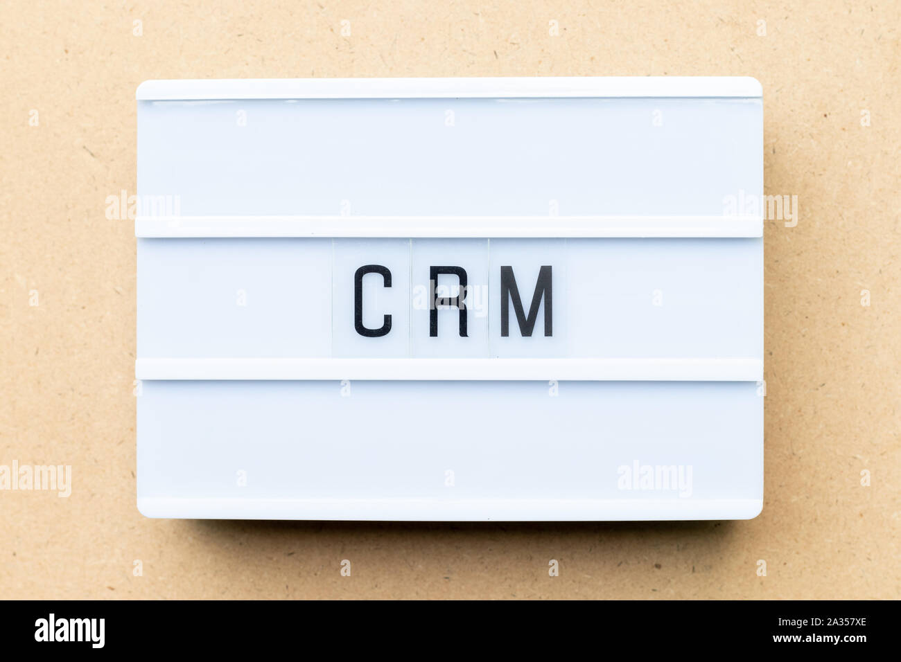 White lightbox with word CRM (Abbreviation of Customer Relationship ...