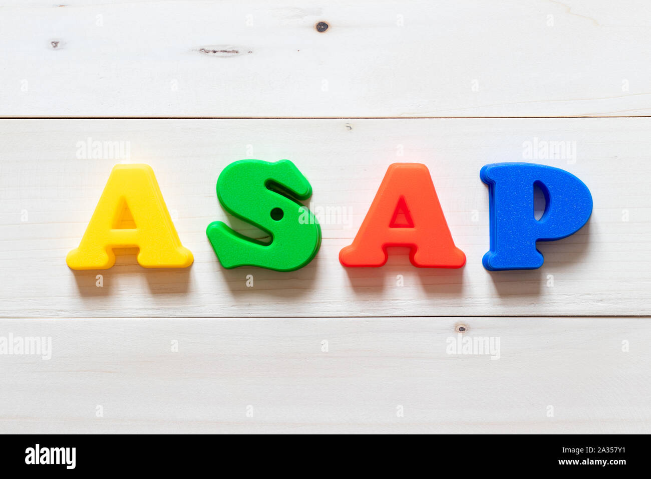 Letter block in word ASAP (Abbreviation of as soon as possible) on white wood background Stock ...
